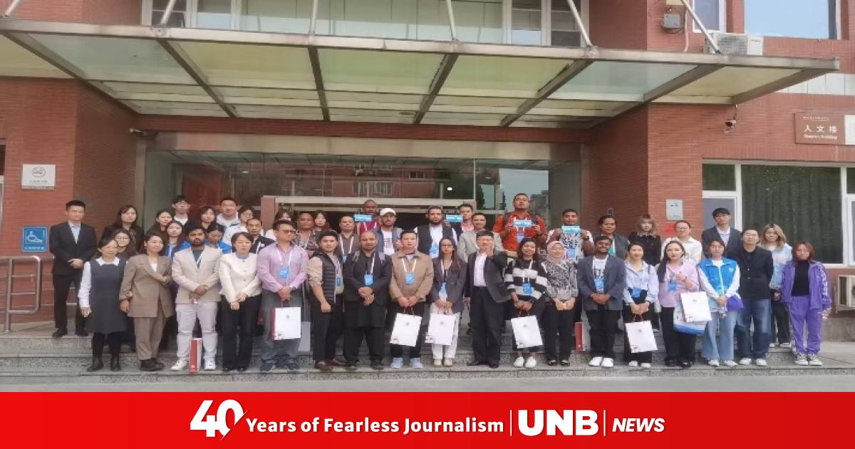 Foreign journalists visit Beijing International Studies University