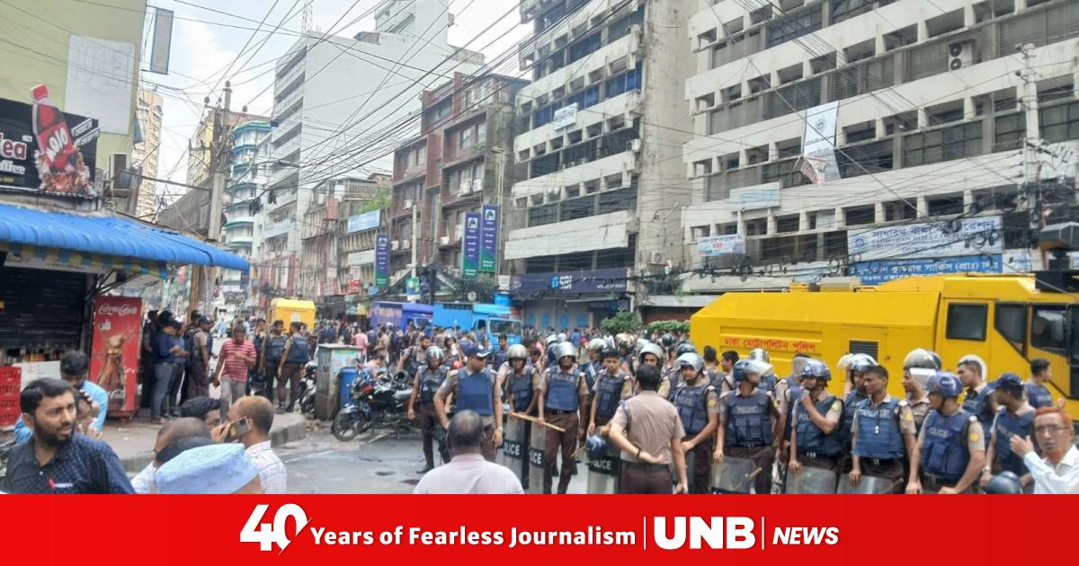 Police disperse protesters near Islami Bank headquarters with water ...