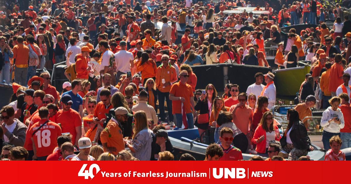 Orange-clad crowds cram into Dutch cities to celebrate king's birthday